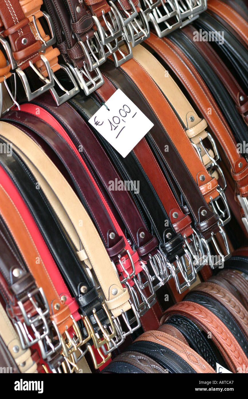 Market stall selling belts Stock Photo - Alamy