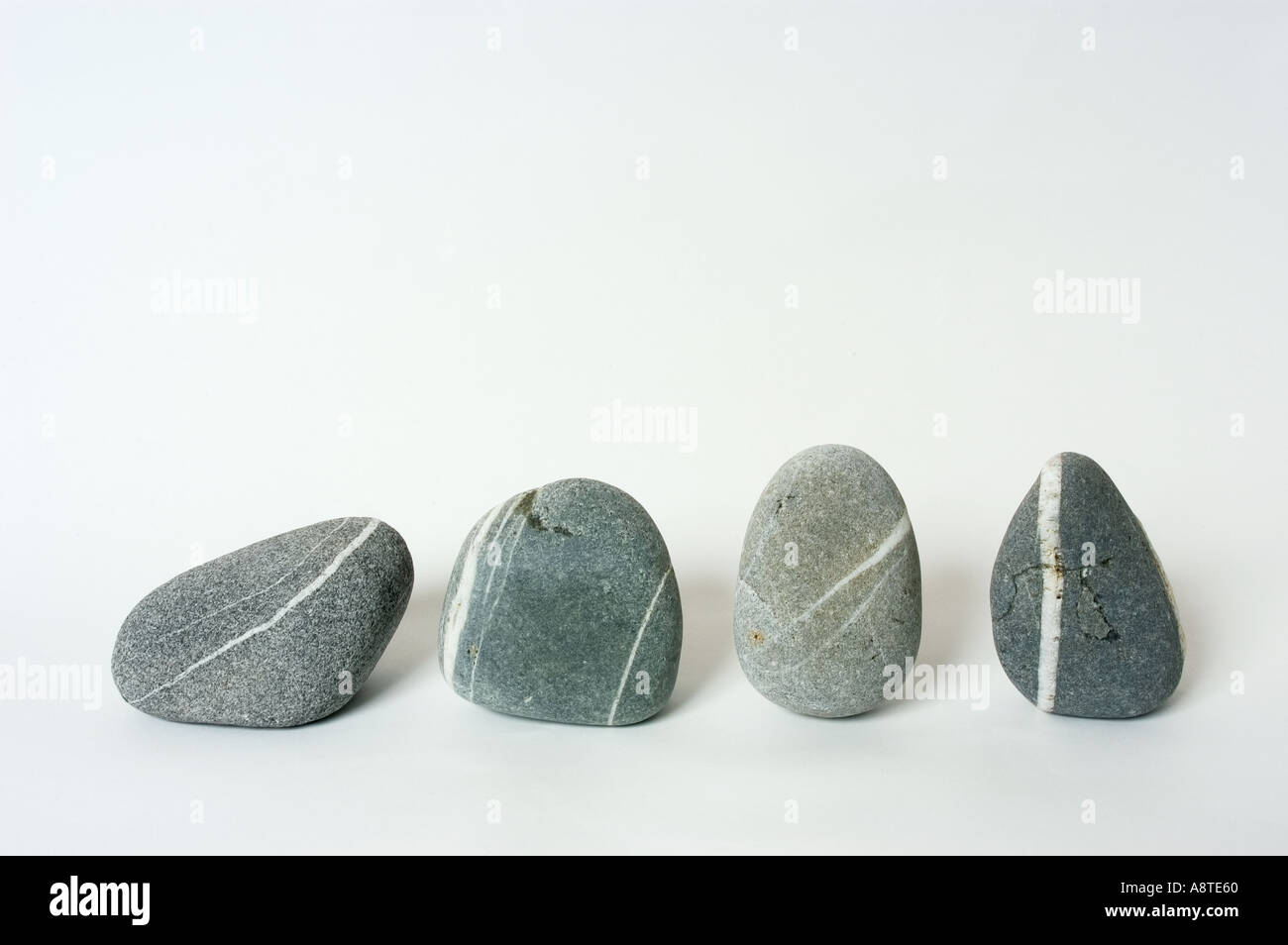 Four Stone with Shadows Stock Photo - Alamy