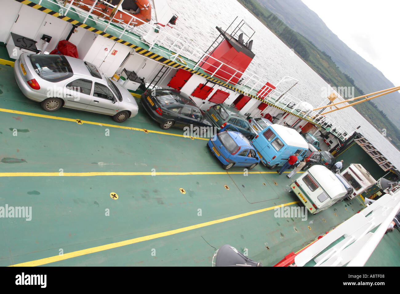 Car ferry crossing to the Isle of Mull in the Western Isles of Scotland ...