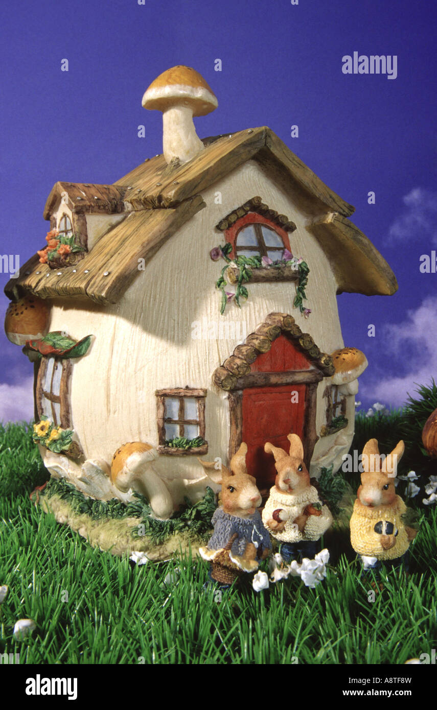 easter bunnies in front of their house Stock Photo - Alamy