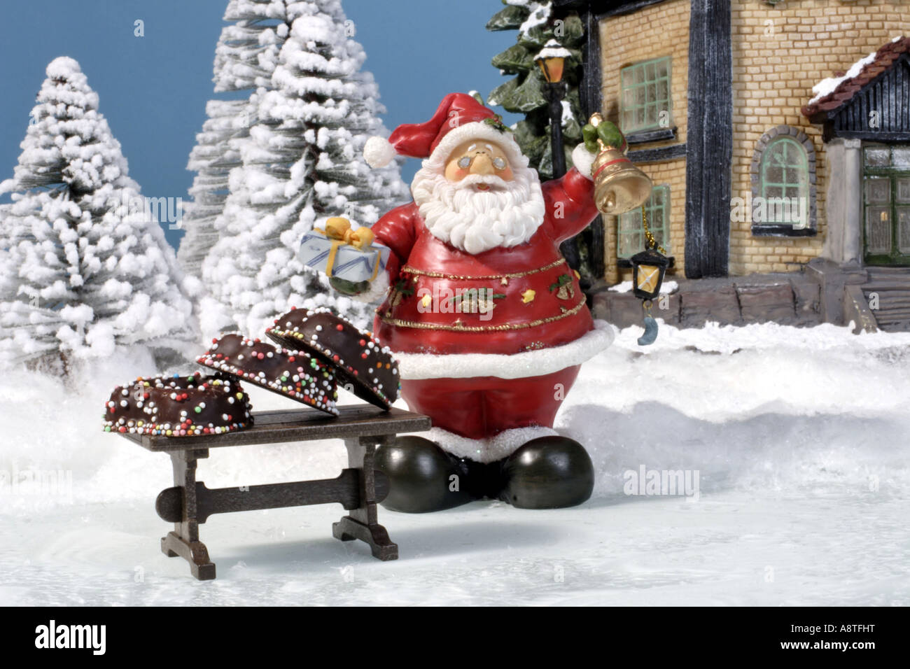Santa Claus with sweets Stock Photo - Alamy
