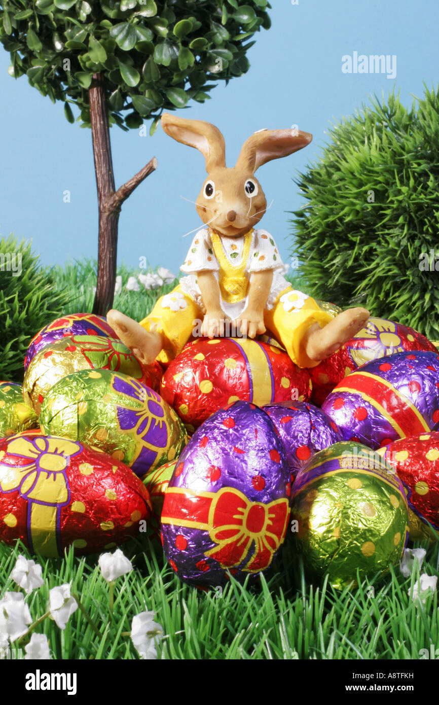 Easter bunny sitting Easter eggs Stock Photo - Alamy