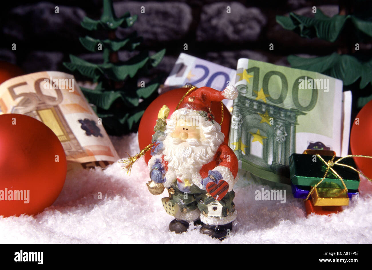Santa Claus with banknotes Stock Photo - Alamy