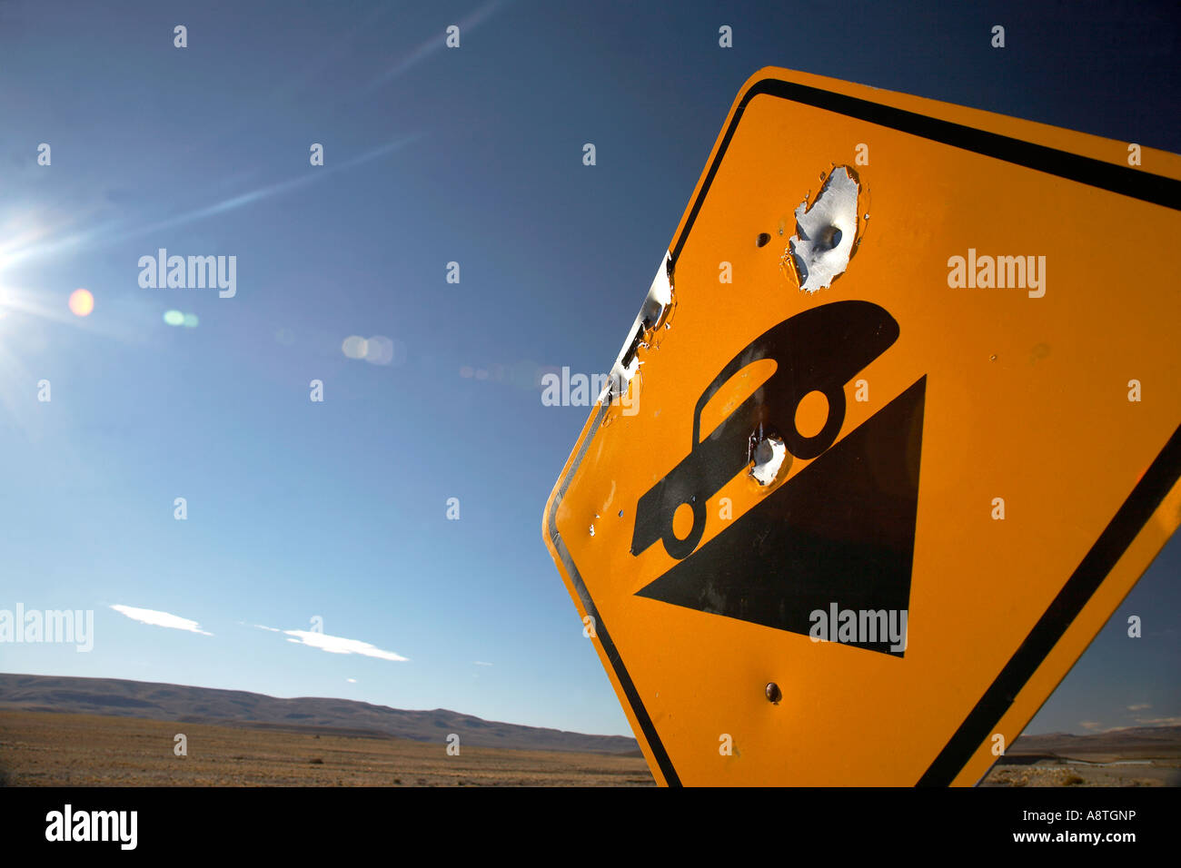 bullet holes in road sign, Patagonia, Argentina Stock Photo - Alamy