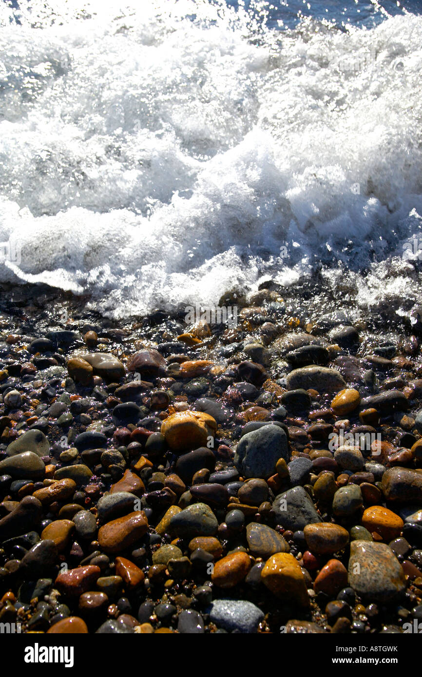 Water running over pebbles rocks hi-res stock photography and images ...