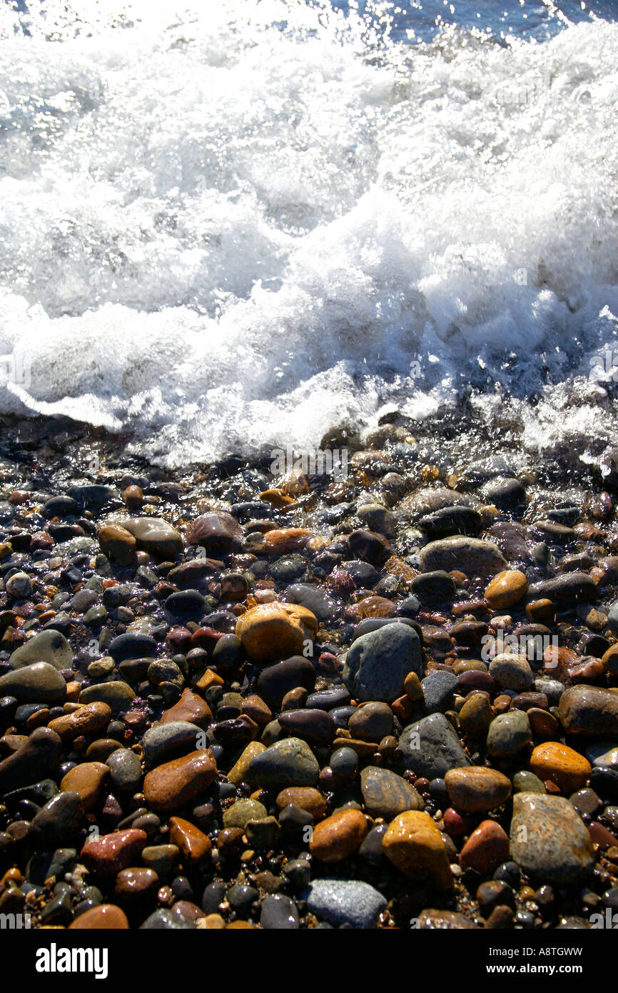 pebbles water on lake shore Stock Photo - Alamy