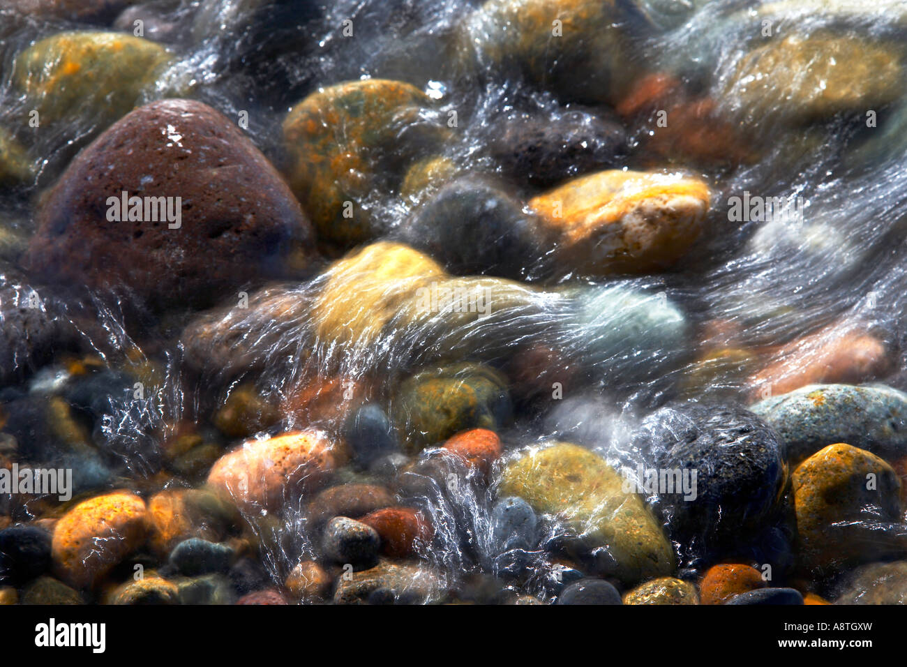 pebbles water on lake shore Stock Photo - Alamy