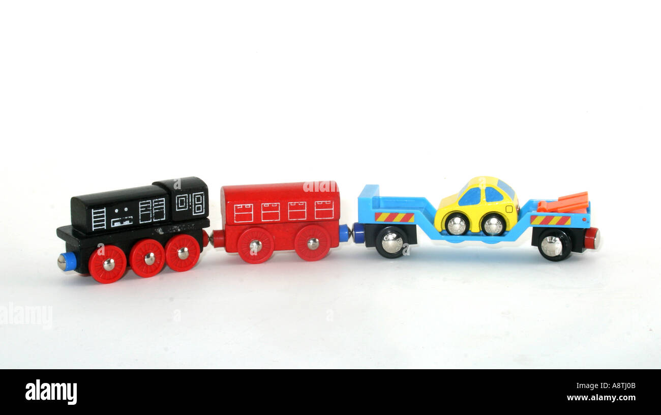 Wooden diesel train carriage and low loader Stock Photo - Alamy