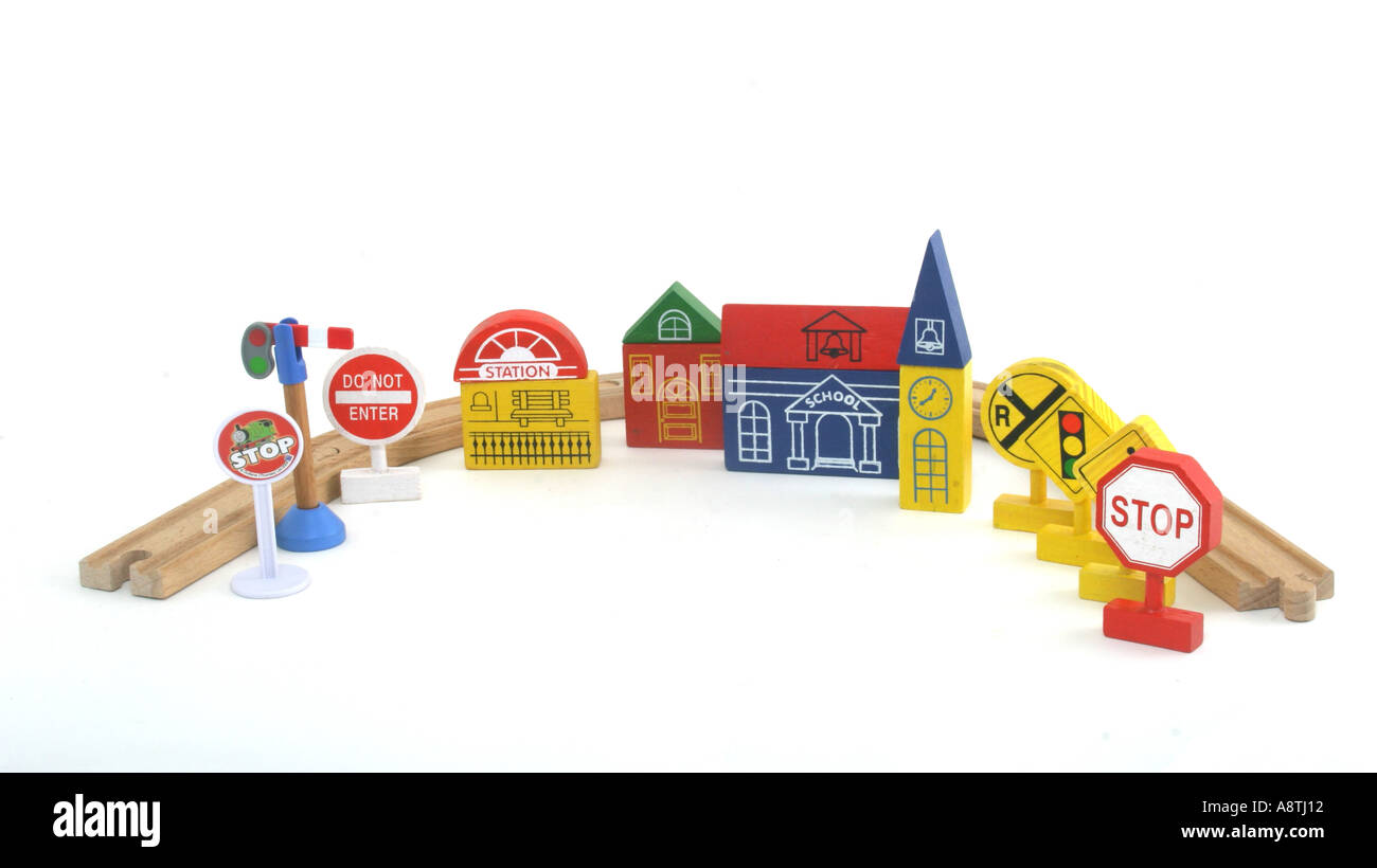 Wooden track signs and buildings Stock Photo - Alamy