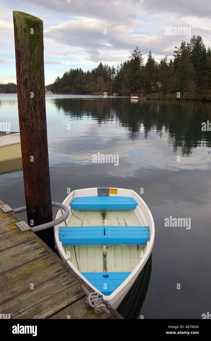 Rowboat by dock hi-res stock photography and images - Alamy