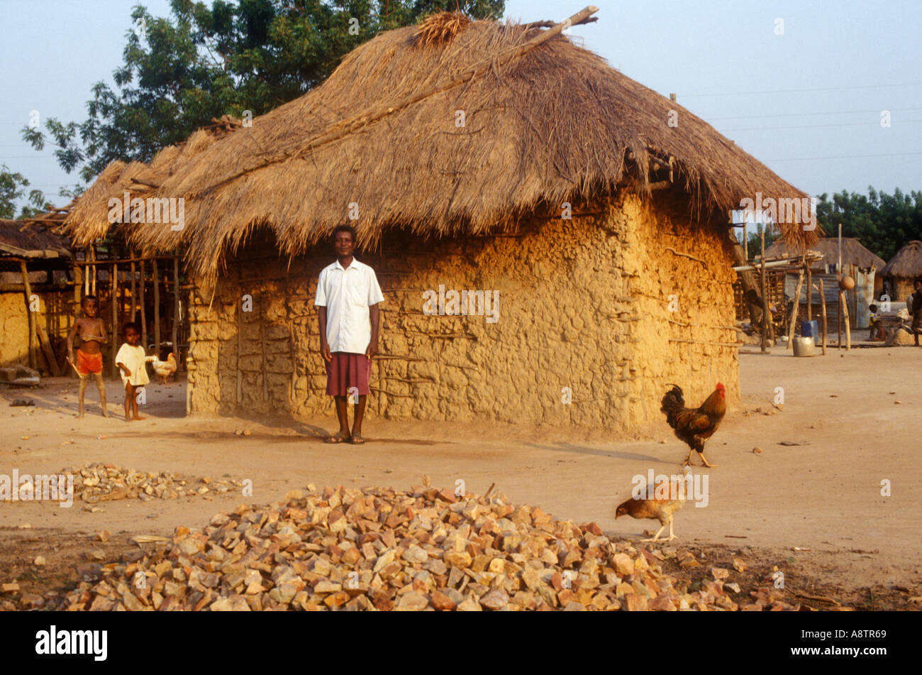 A rural mud walled thatch roofed building in Ghana Stock Photo - Alamy