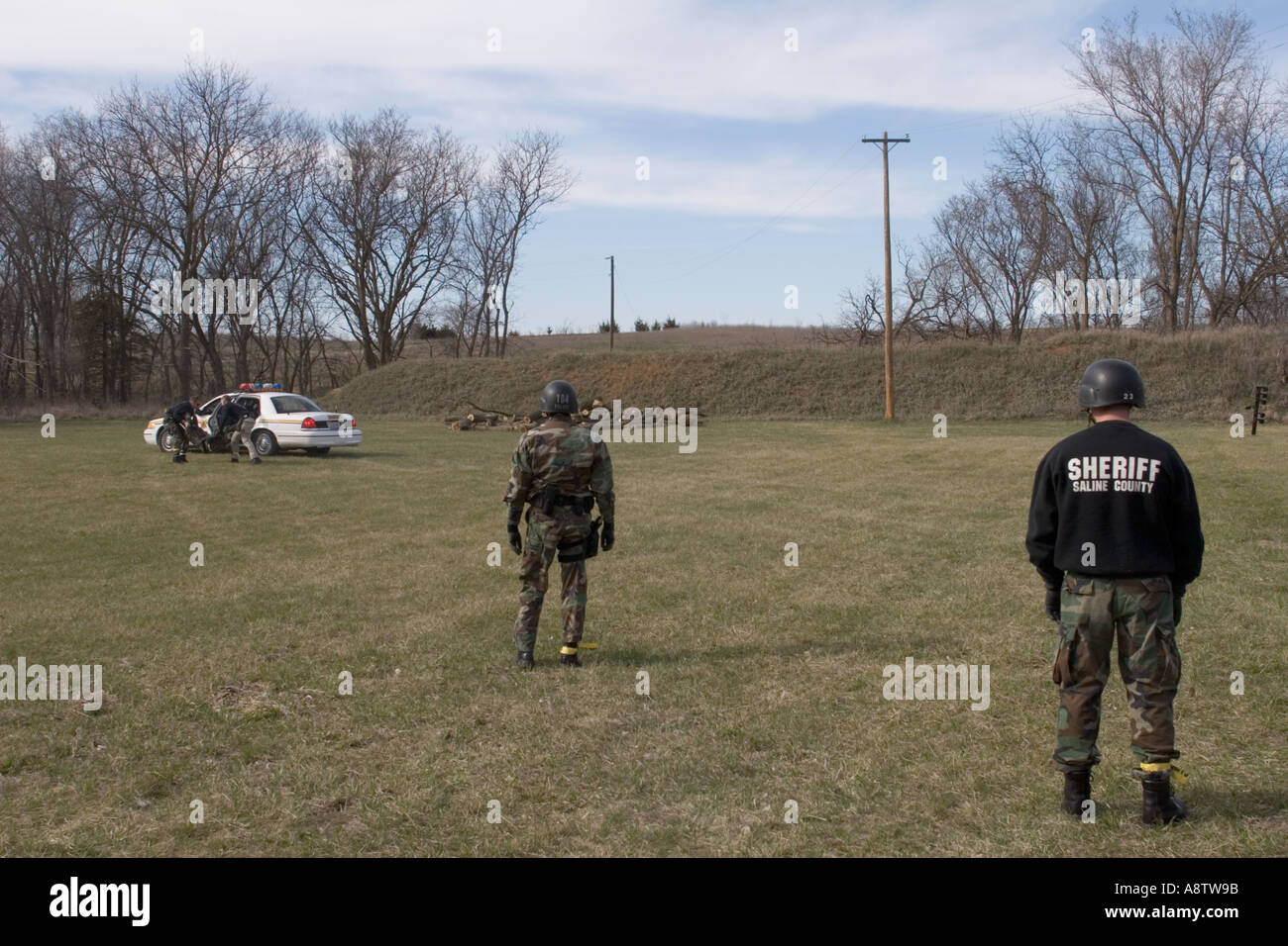 SWAT team training Retreiving injured officer from line of fire hot ...