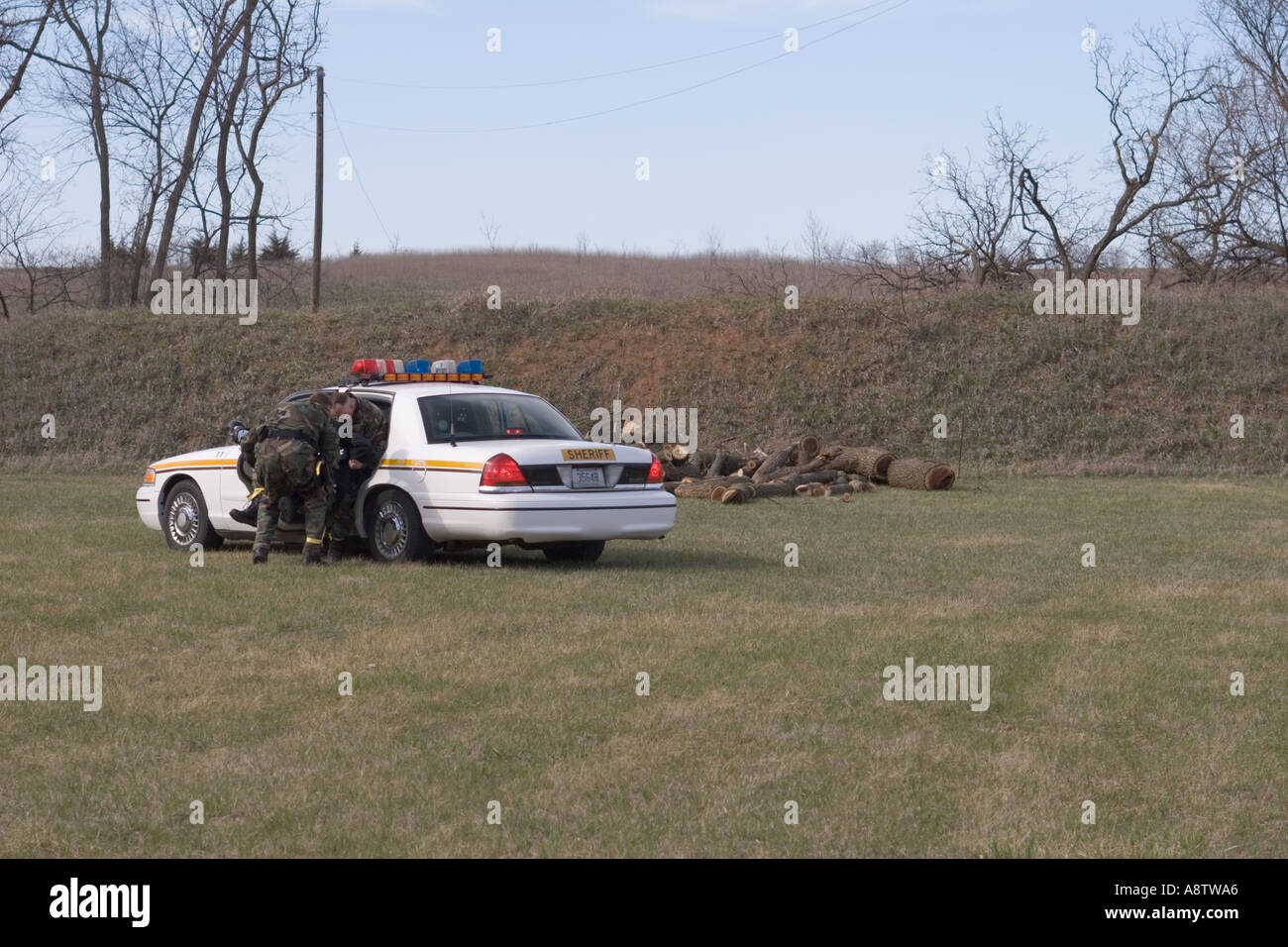 SWAT team training Retreiving injured officer from line of fire hot ...