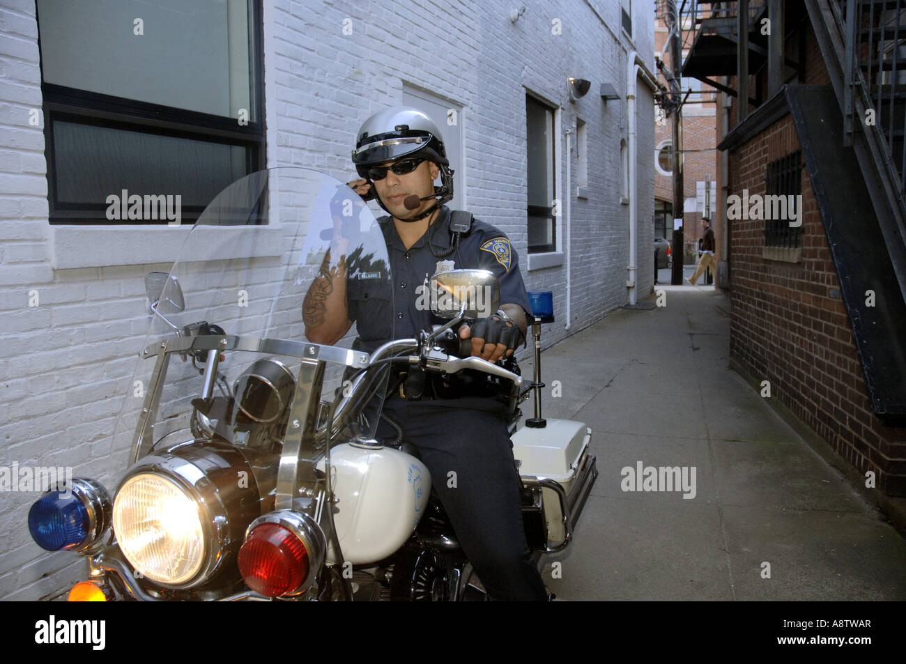 New Haven, CT. Hispanic motorcycle policeman on his Harley Davidson ...