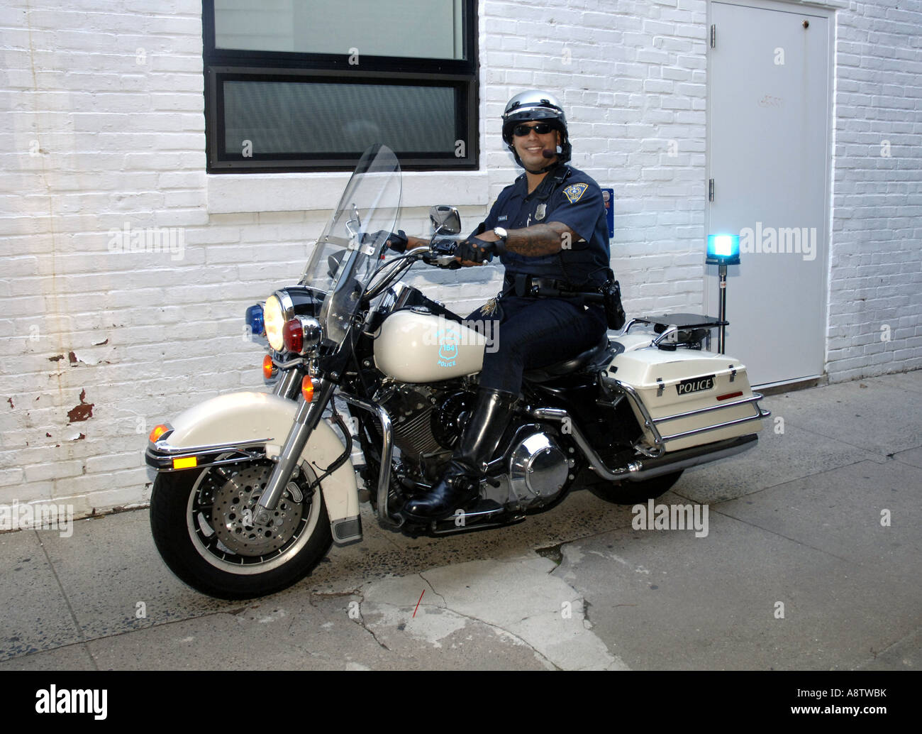 New Haven, CT. Hispanic motorcycle policeman on his Harley Davidson ...