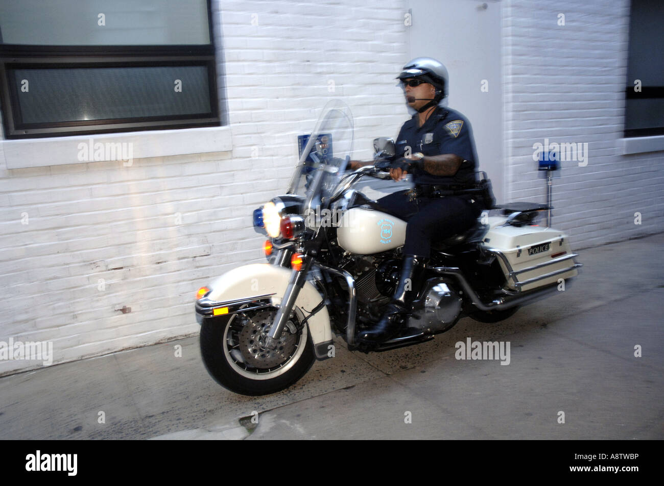 New Haven, CT. Hispanic motorcycle policeman on his Harley Davidson ...