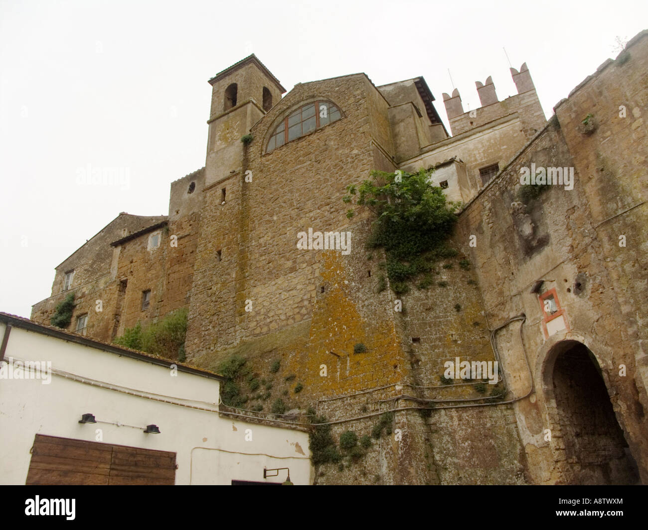 City entrance gate at the medieval town of Vecchia Calcata, valley of ...