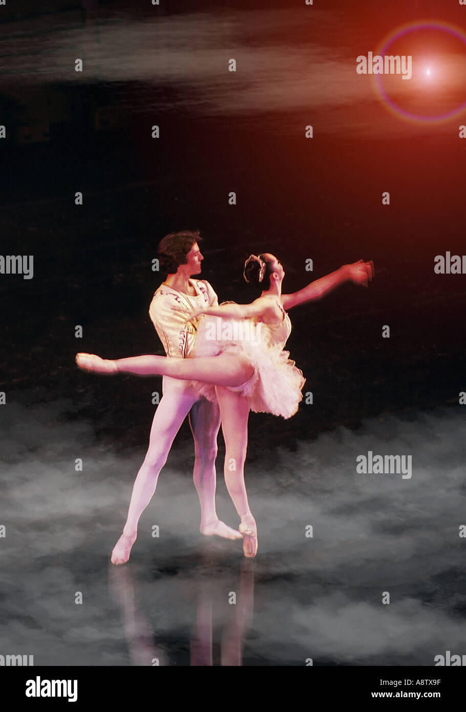 Male and female ballet partners performing on stage Stock Photo - Alamy