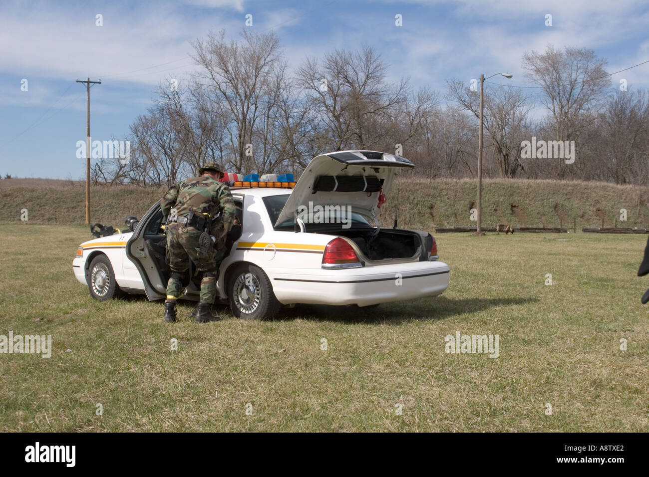 SWAT team training Retreiving injured officer from line of fire hot ...