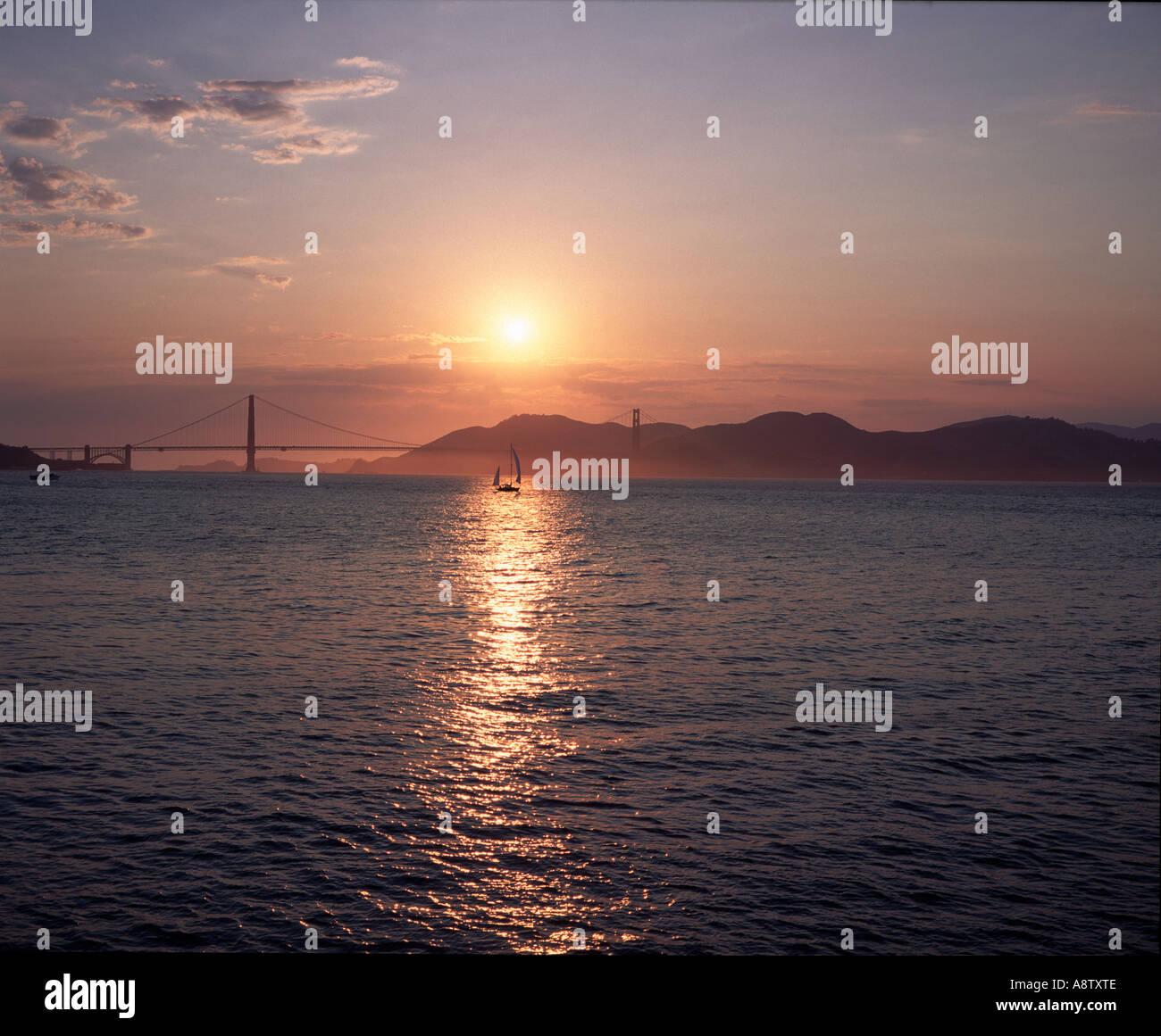 sailing at sunset past the golden gate bridge san francisco usa Stock ...