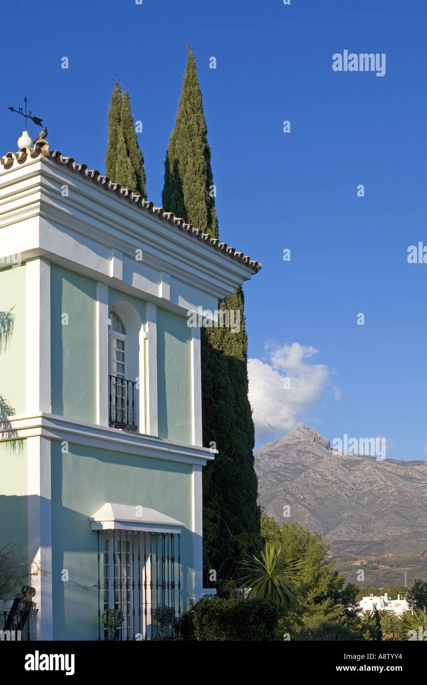 Green building and mountain views of Aloha Pueblo in Spain on the Costa ...