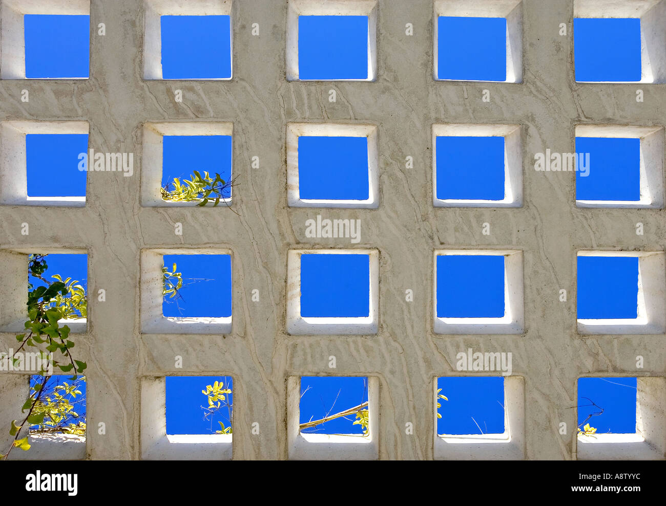 Abstract bright blue squares of modern architecture with sunny sky ...