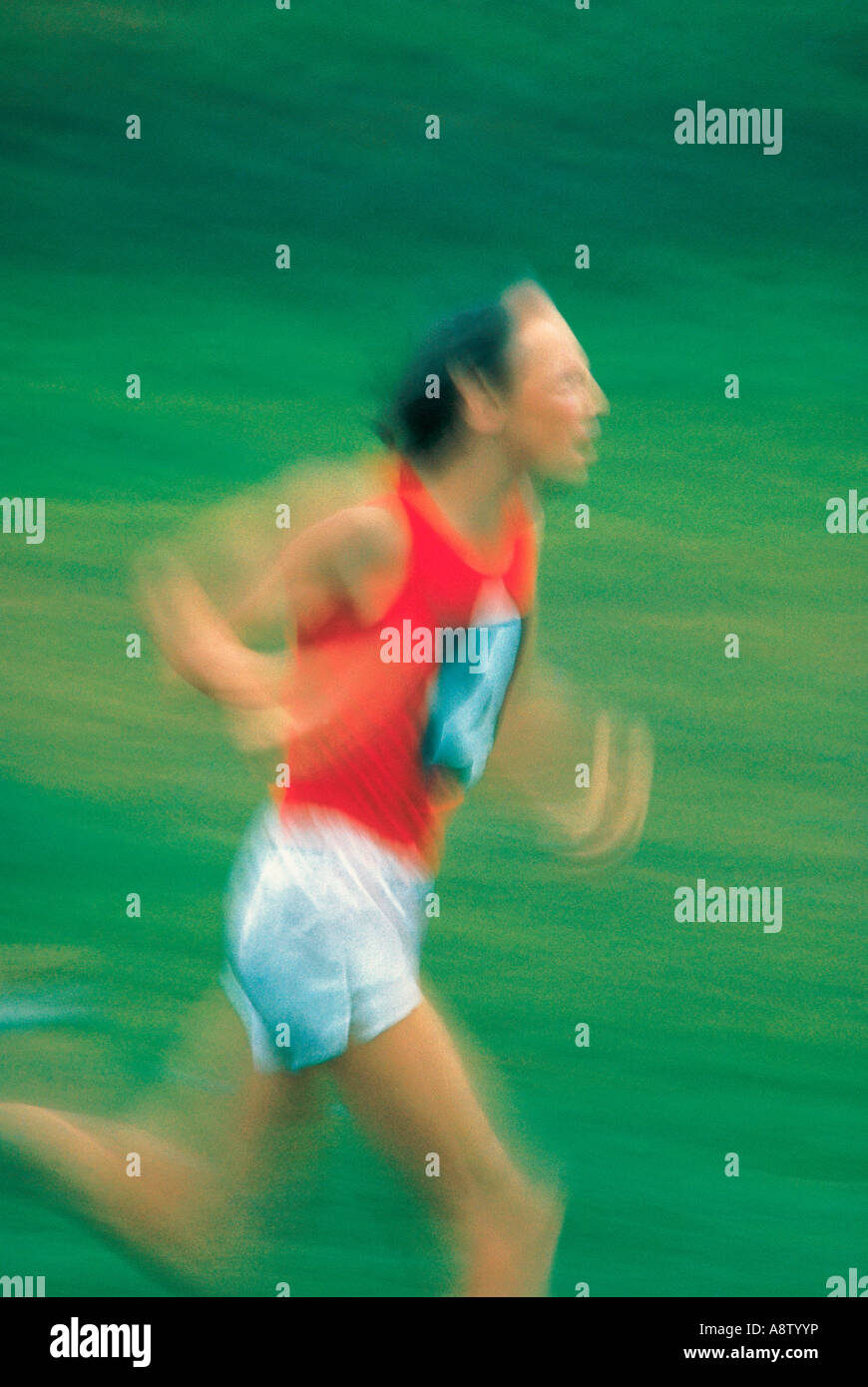 Close-up speed impression side view of male marathon runner Stock Photo ...