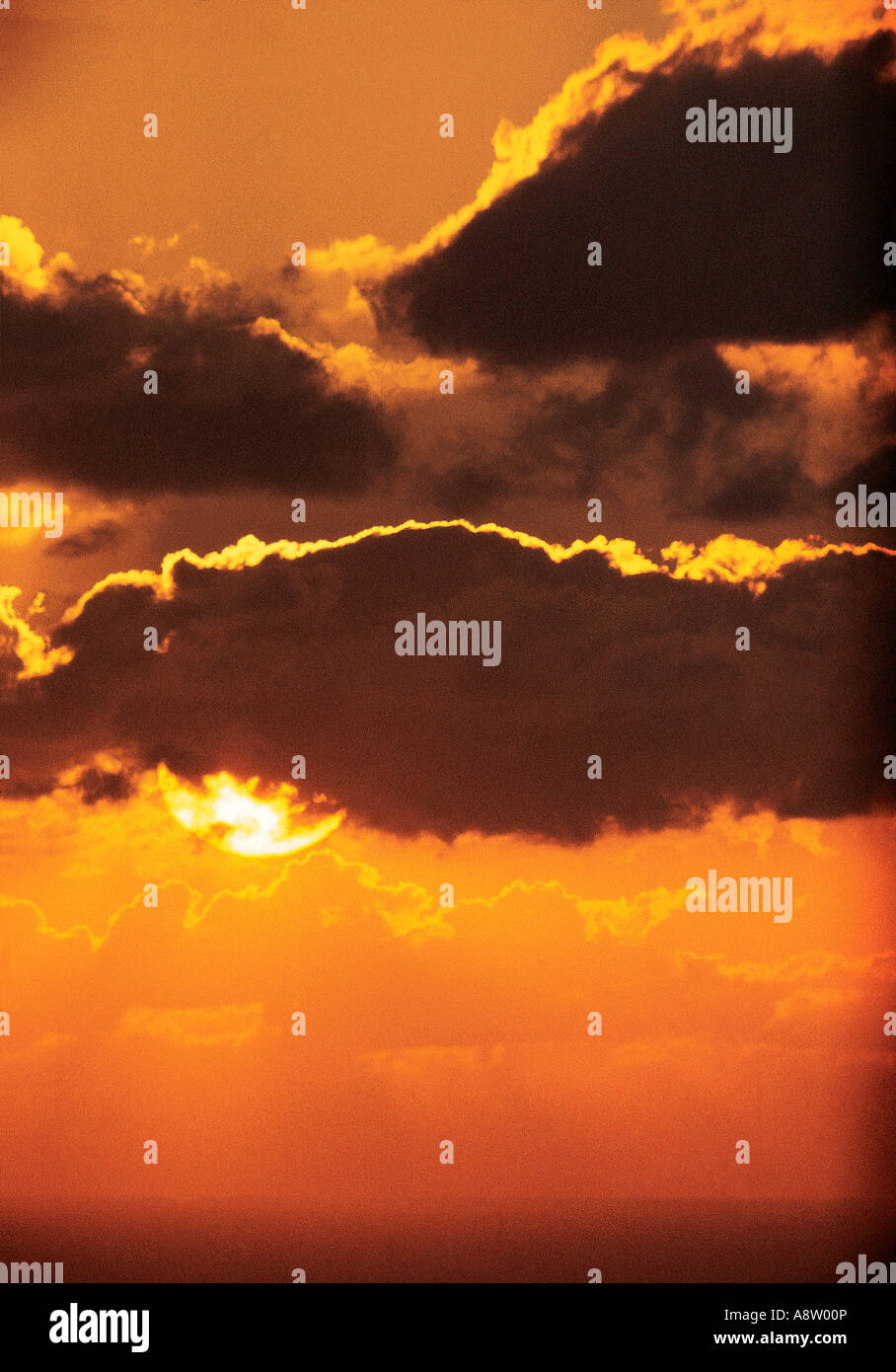 Stormy sunset over the ocean Stock Photo - Alamy