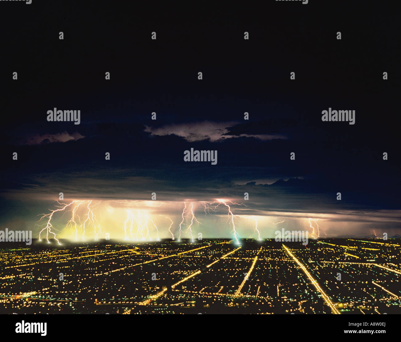 United States. Illinois. Chicago. Lightning over city suburbs at night ...