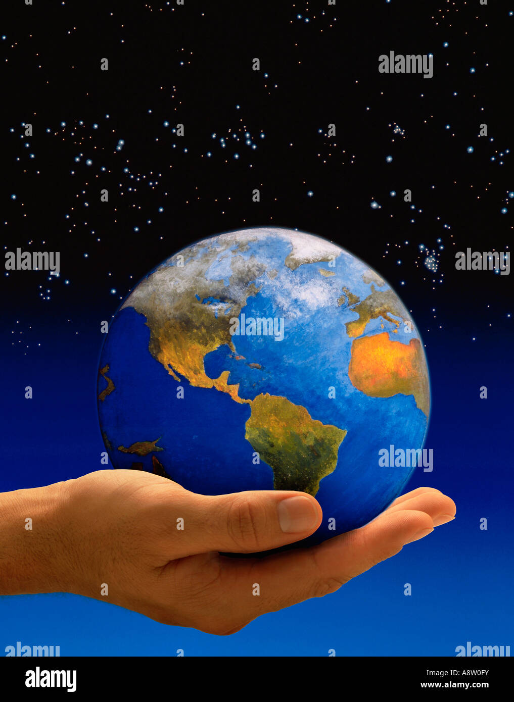 Concept montage of planet earth globe held in palm of man's hand Stock ...