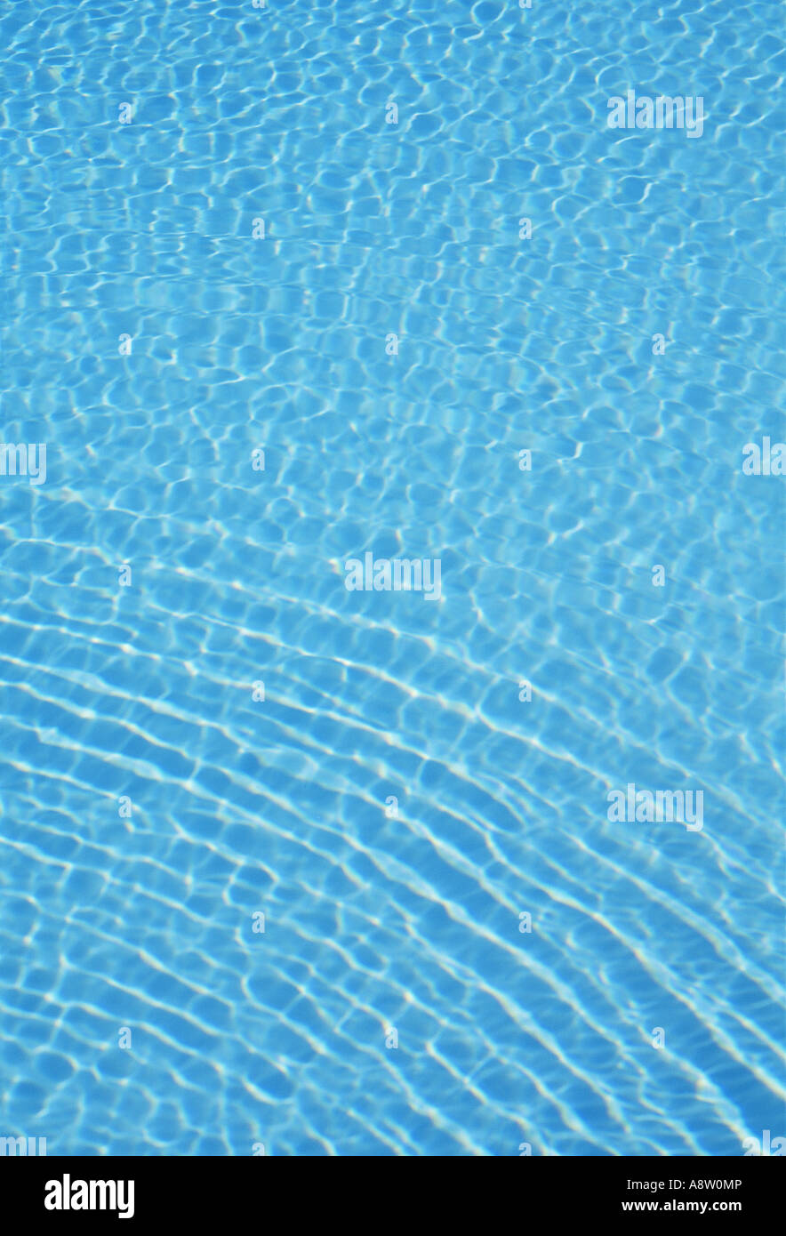View of sunlight patterns on swimming pool blue water surface Stock ...