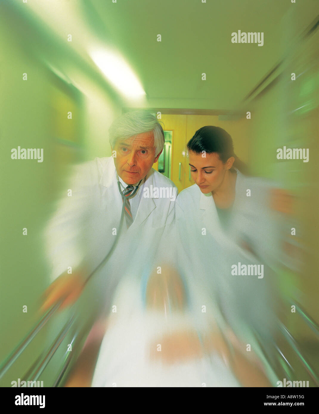 Hospital Accident and Emergency Unit Casualty. Two doctors pushing ...