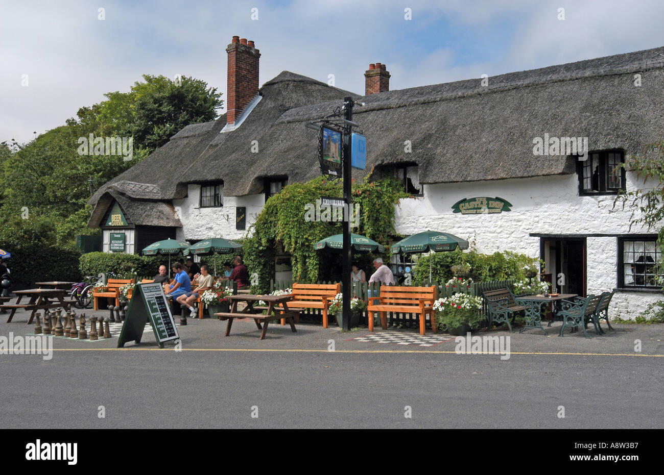 Thatched roof country pub in Lulworth Village Dorset England Stock ...