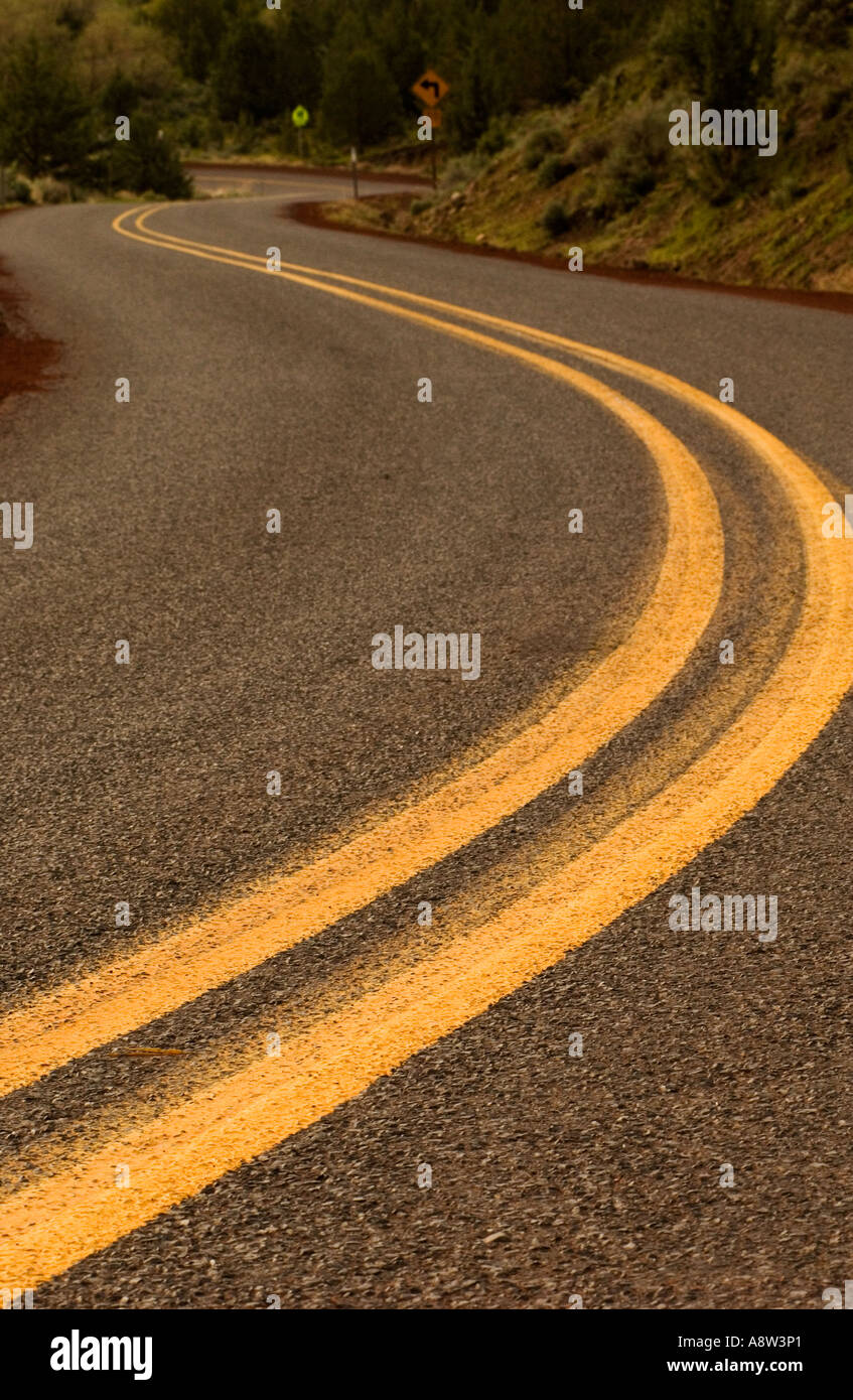 Lonely curved road highway hi-res stock photography and images - Alamy