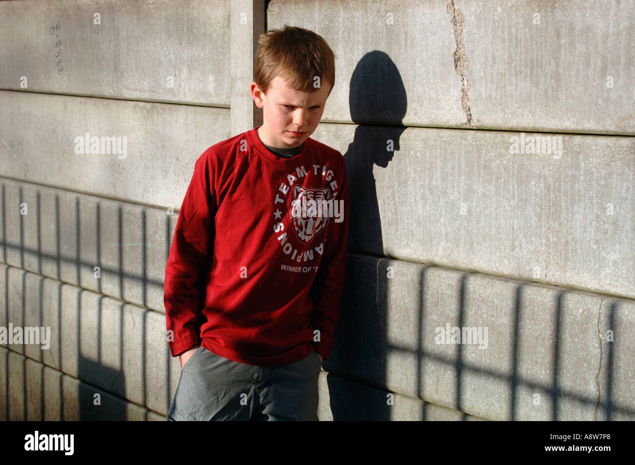 Boy Casting A Shadow Stock Photo - Alamy