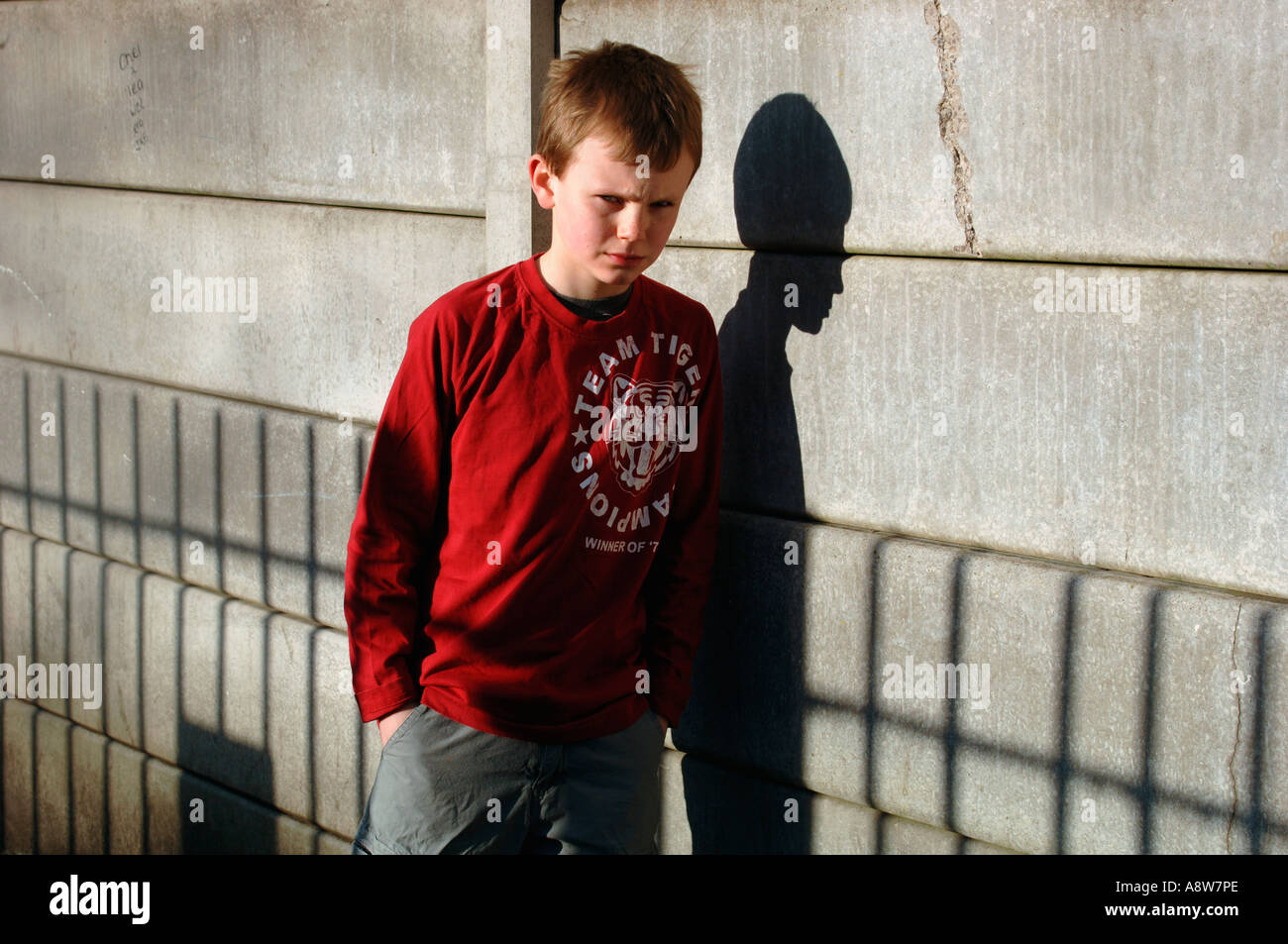 Boy Casting A Shadow Stock Photo - Alamy