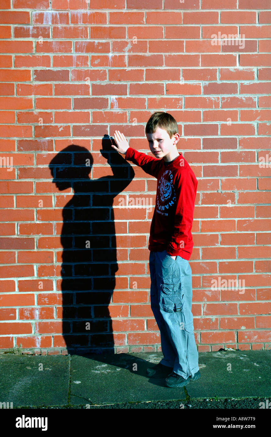 Boy Casting A Shadow Stock Photo - Alamy