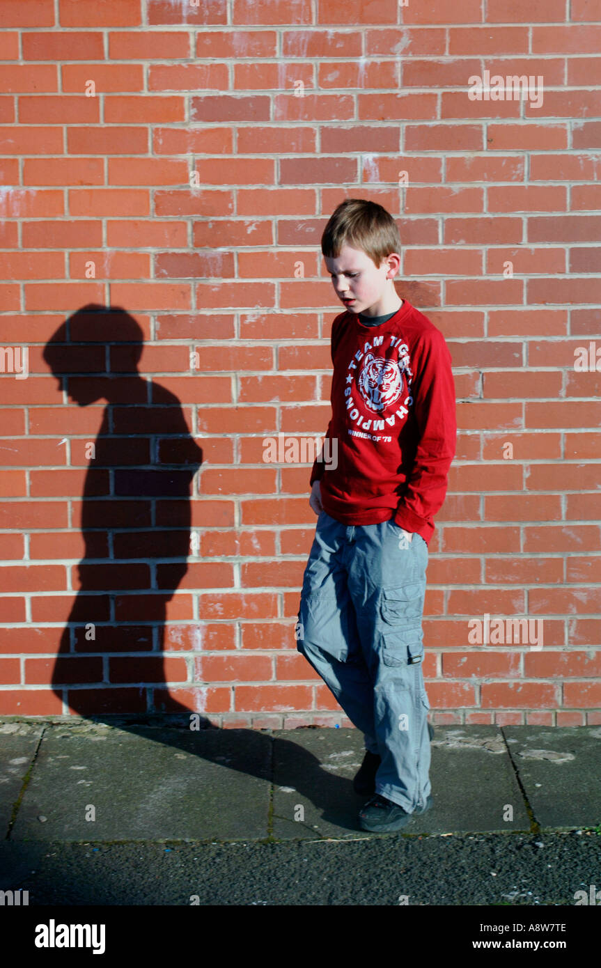 Boy Casting A Shadow Stock Photo - Alamy