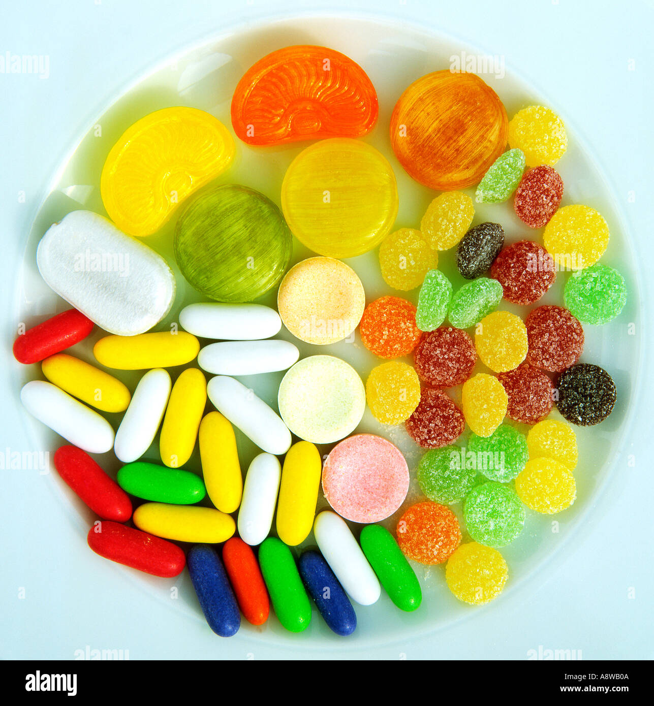 Coloured sugar sweets Stock Photo - Alamy