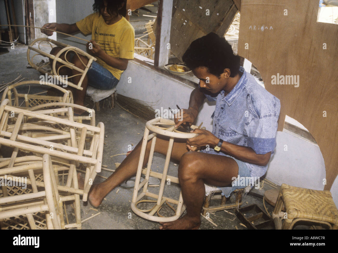 Weaving rattan furniture near Solo Java Indonesia Stock Photo - Alamy