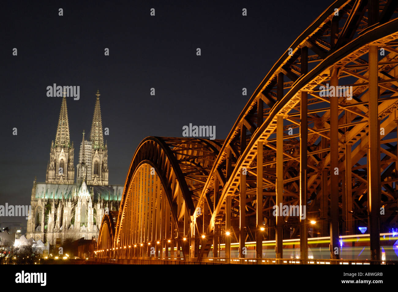 Cologne Cathedral, Hohenzollern Bridge at night Stock Photo - Alamy