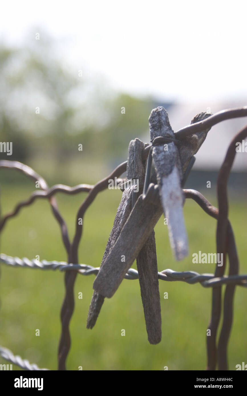 Old clothes pin on rusty old fence Stock Photo - Alamy