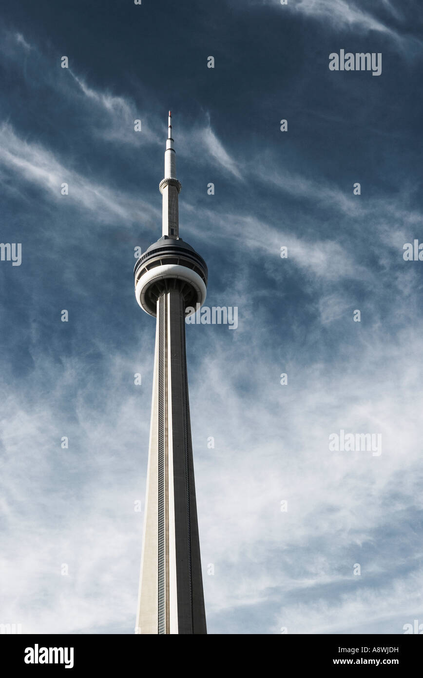 Toronto CN Tower against a blue cloudy sky Stock Photo - Alamy