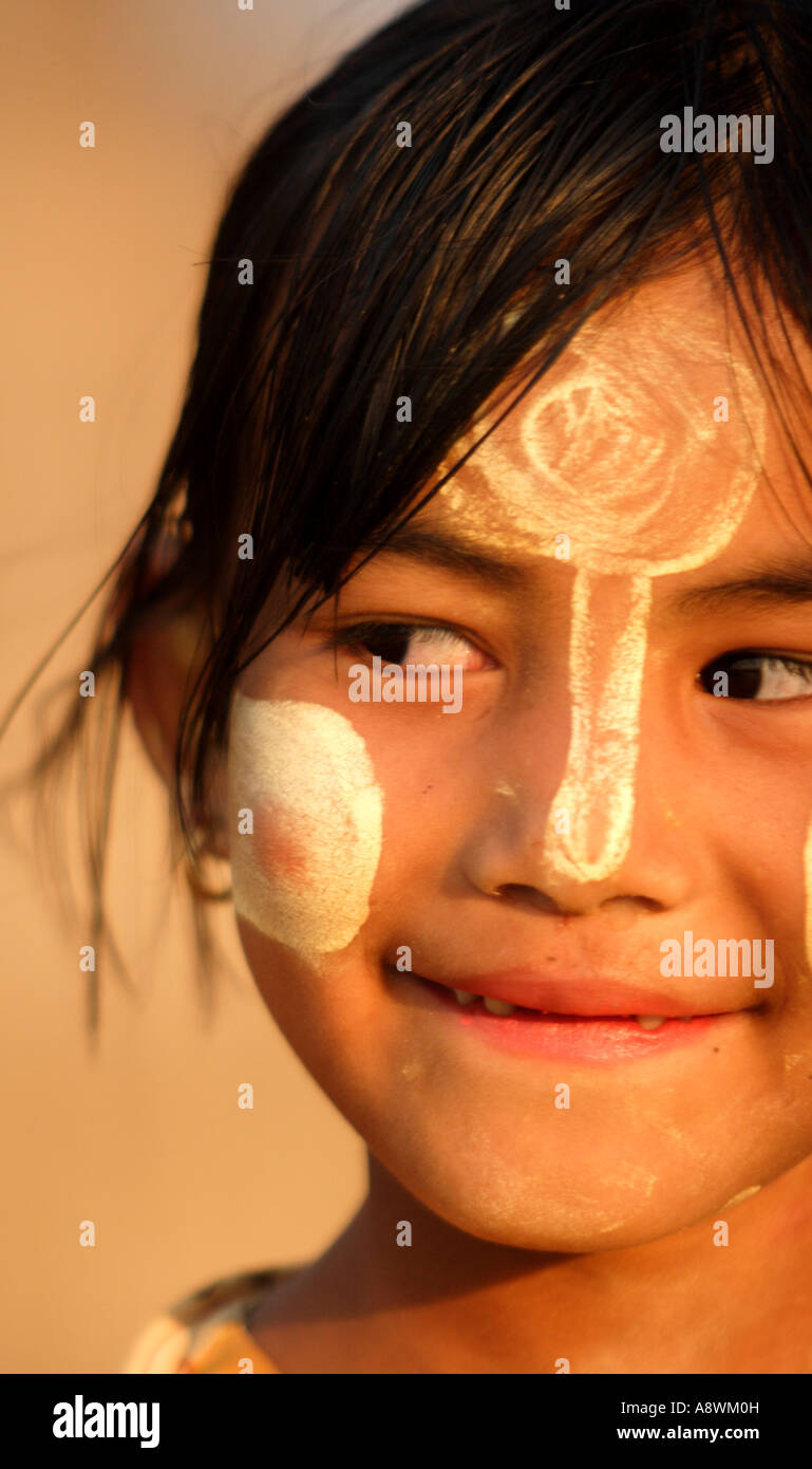 Asia, Myanmar, Shan State, young Burmese girl with colorful face paint ...