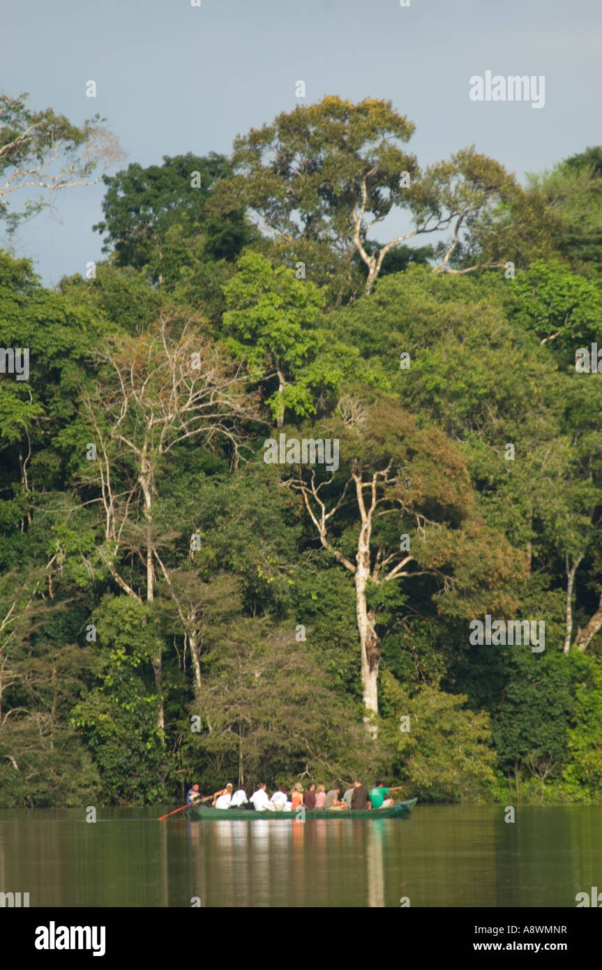Amazon rainforest river canoe tourists hi-res stock photography and ...