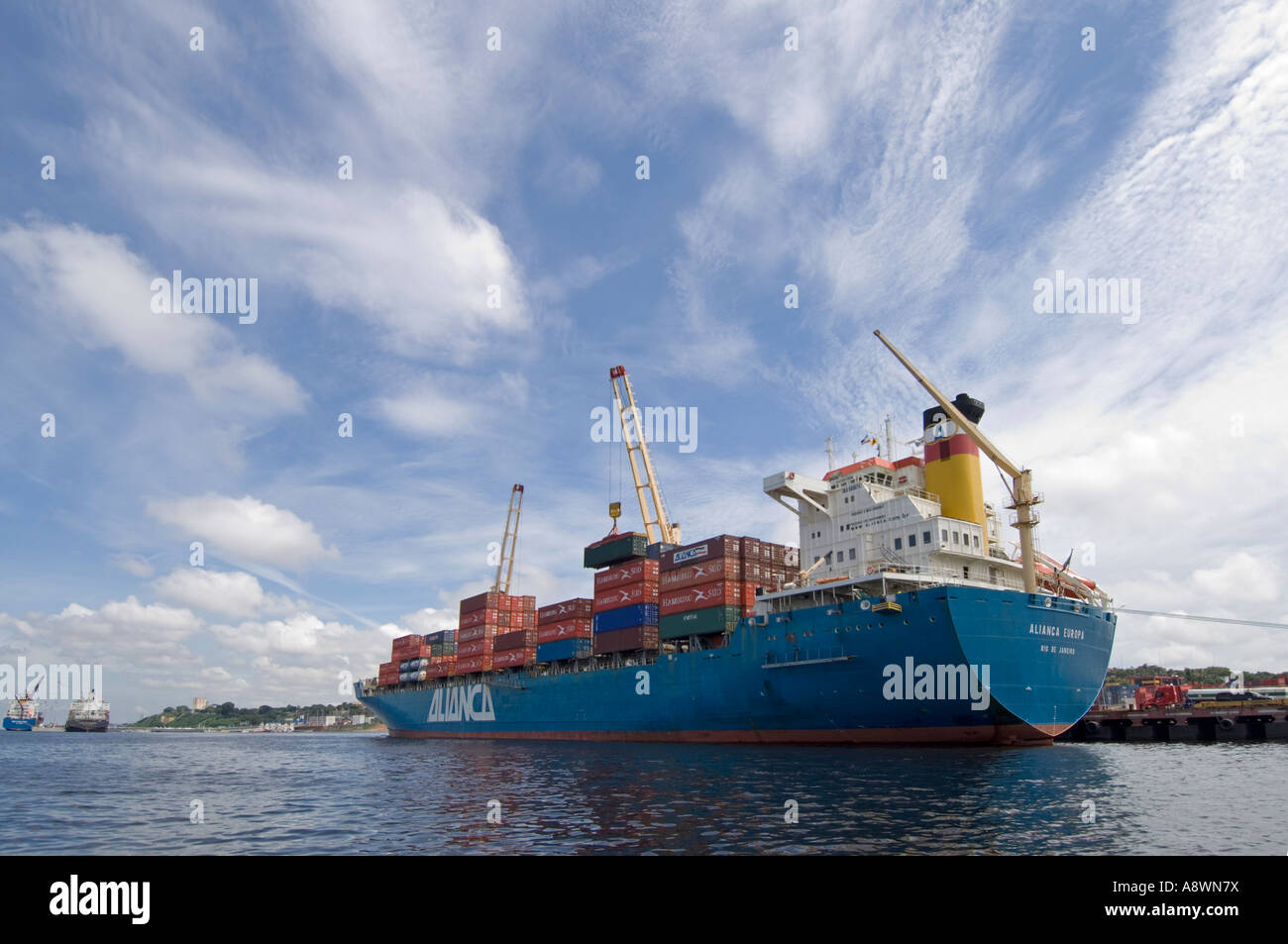 Container ships docked in the port of Manaus unloading or loading goods ...