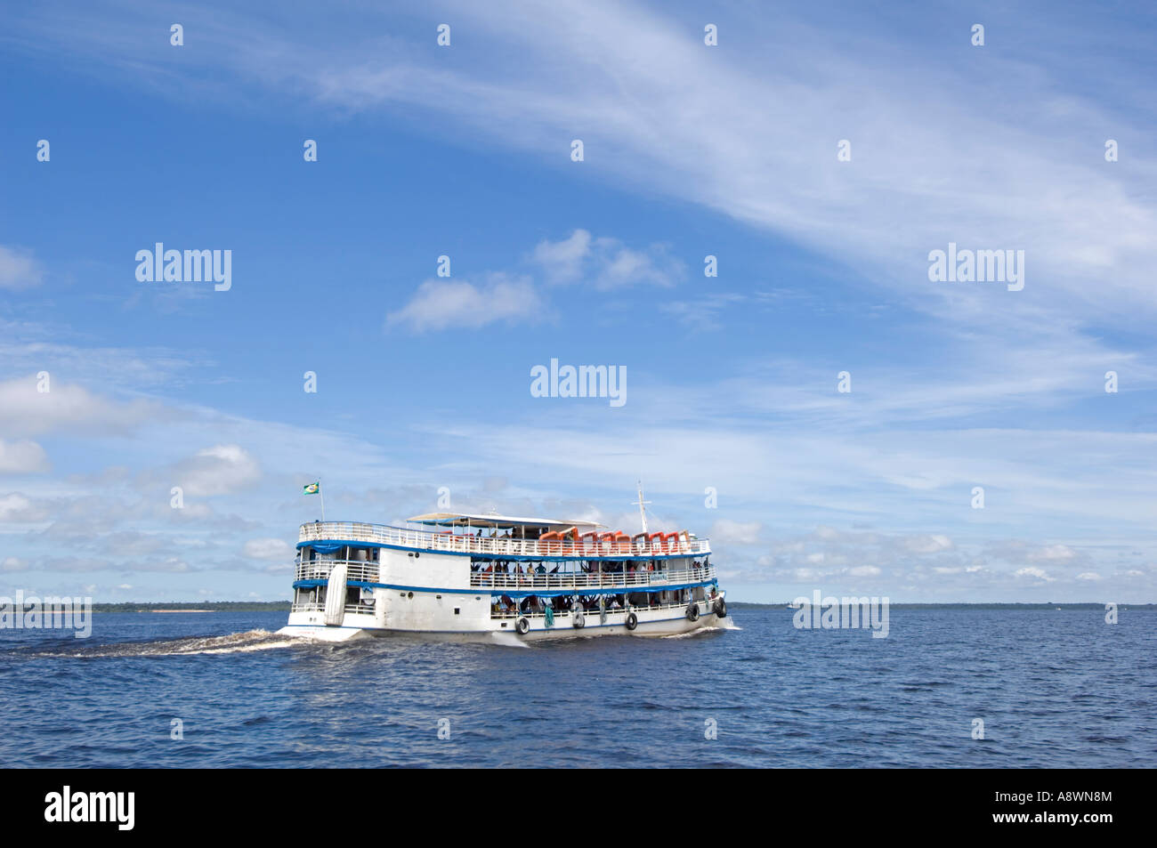 A typical and traditional public ferry on its way in to Manaus Stock ...