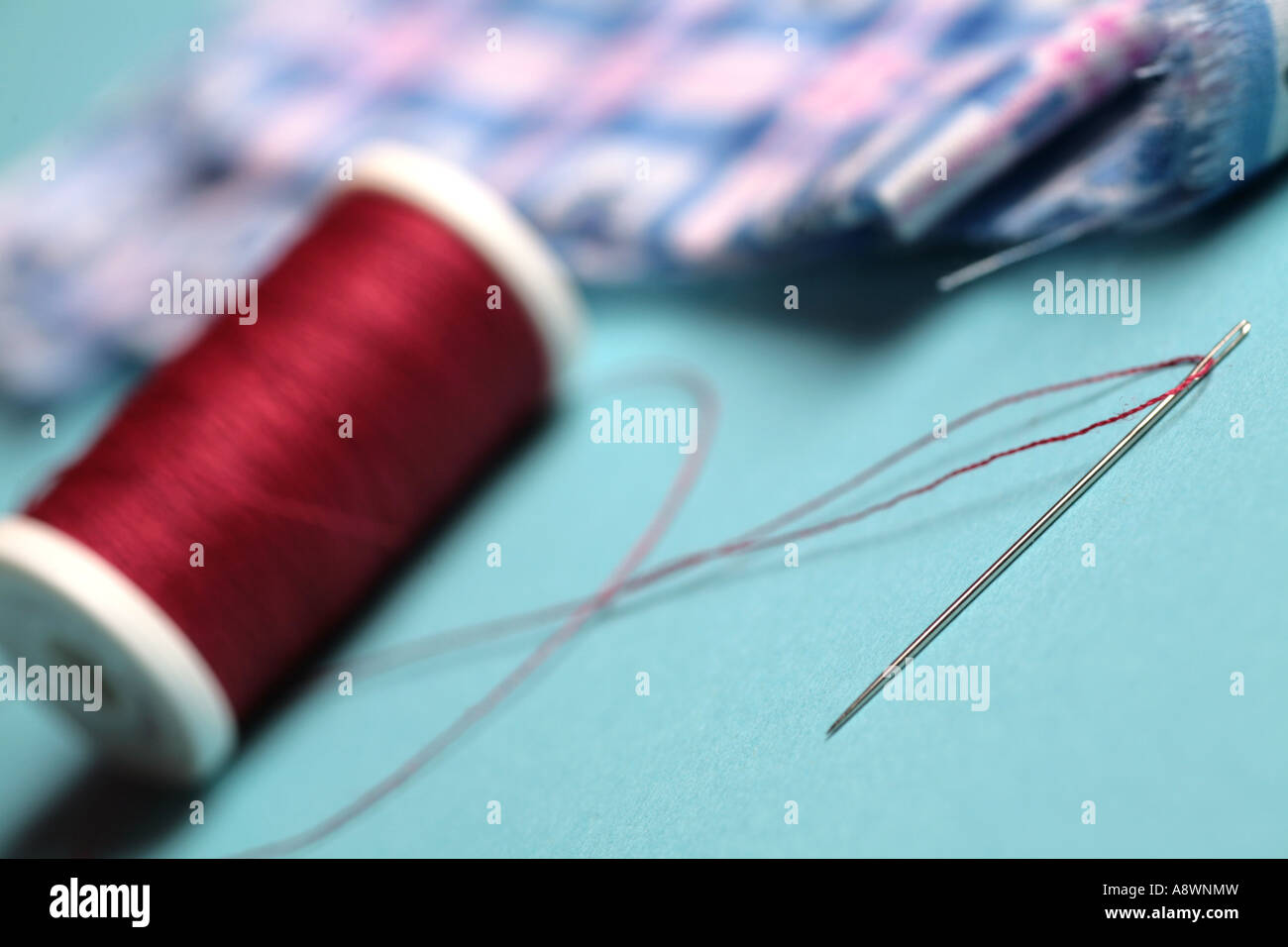 needle and thread Stock Photo - Alamy