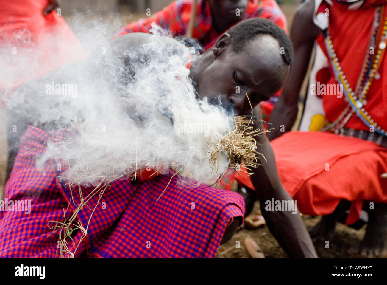masai tribesmen demonstrating traditional method of making fire Stock ...