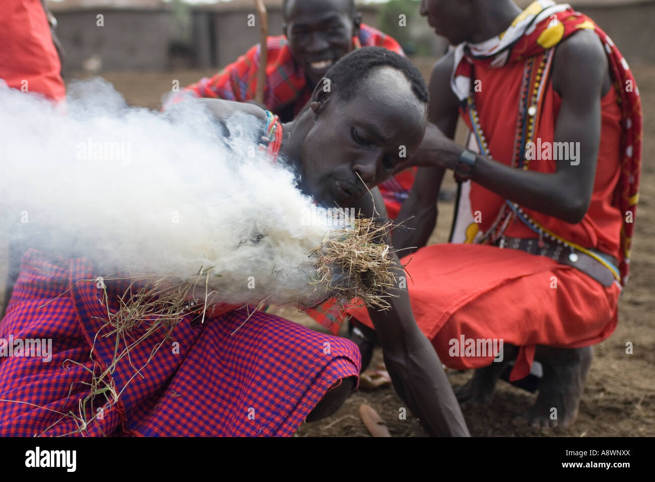 masai tribesmen demonstrating traditional method of making fire Stock ...